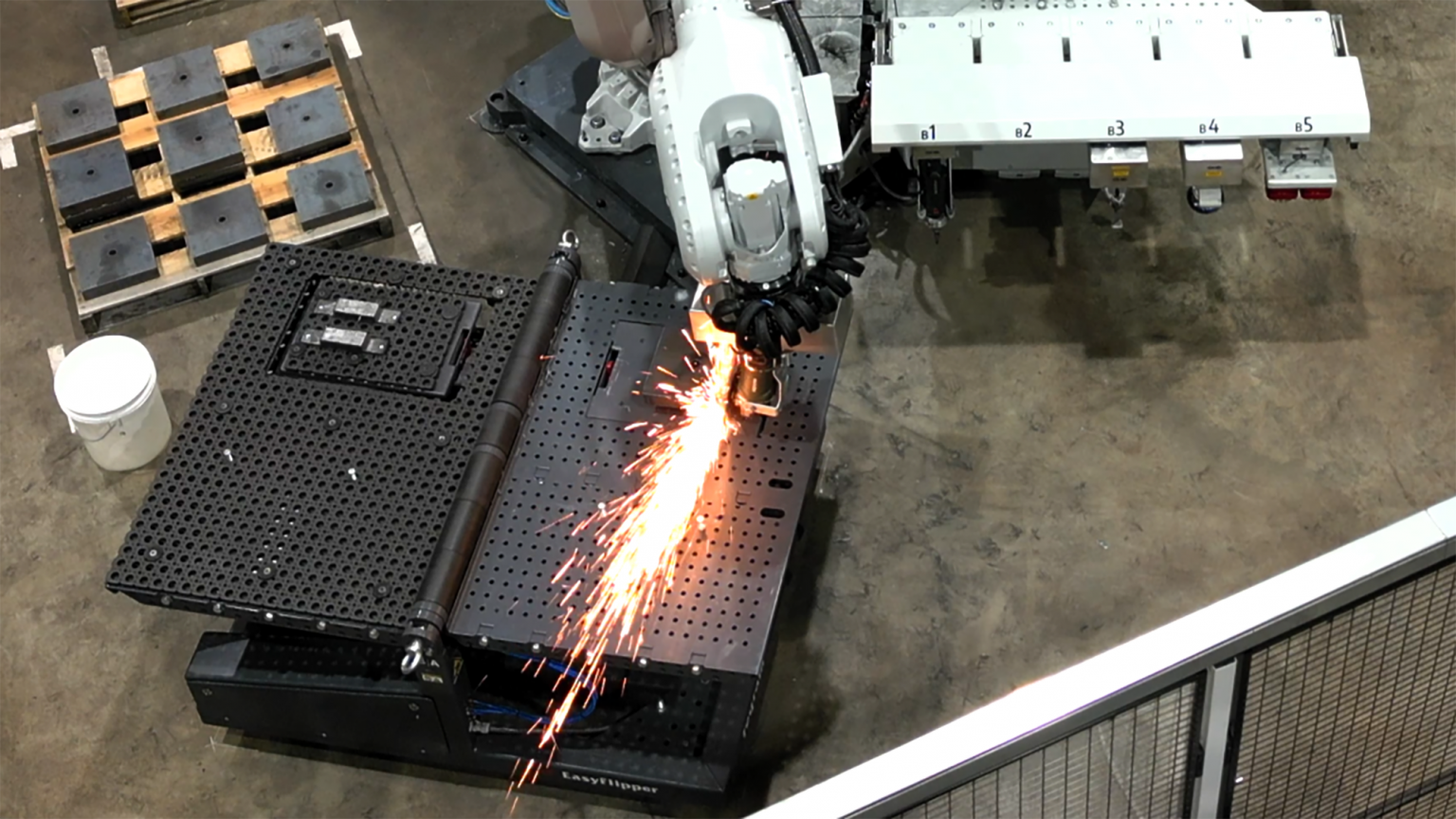 AI-controlled sanding robot deburrs thick sheet metal parts faster ...
